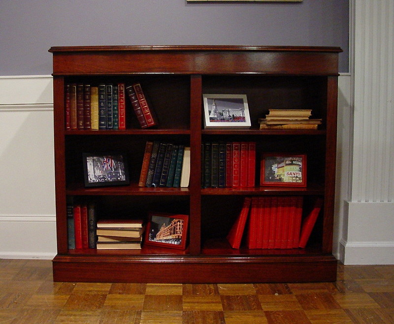 Mid cherry yew wood banded breakfront bookcase on plinth base