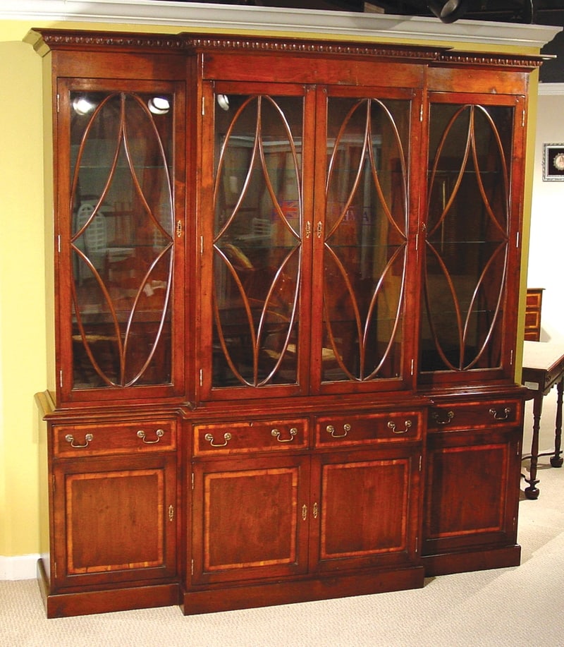 Mid cherry yew wood banded breakfront bookcase on plinth base