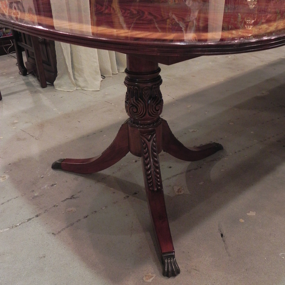 Mahogany, banded double pedestal table with three 22" leaves