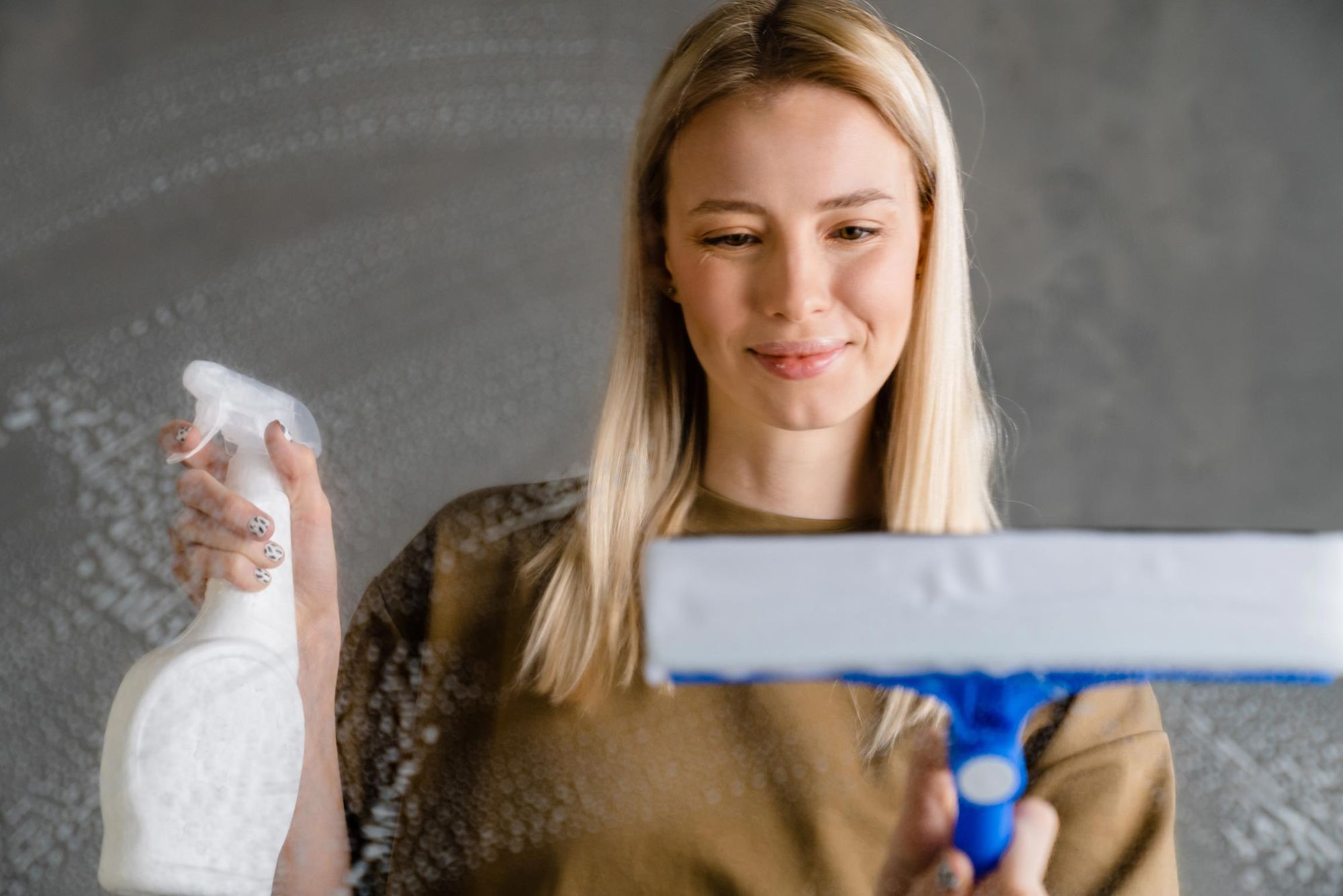 What causes streaks when cleaning windows?