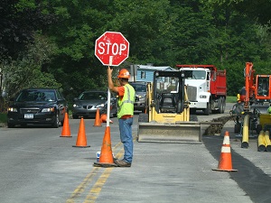 Flaggers Keep Drivers, Pedestrians and Crews Safe