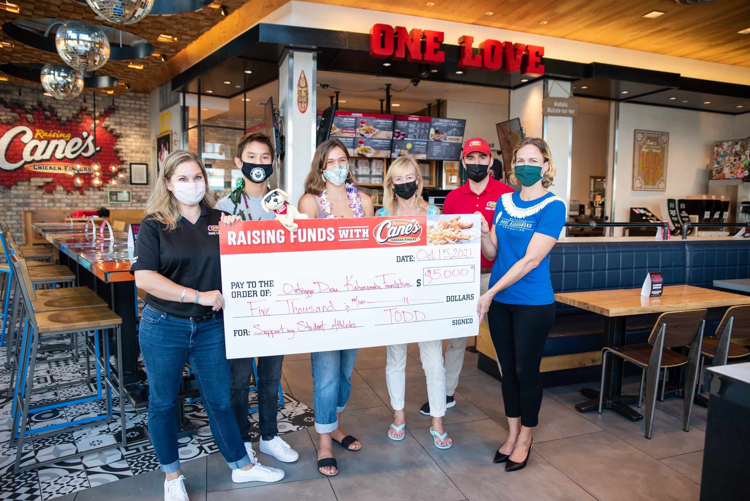 Gift from Raising Cane's helps promote opening of ODKF Scholarships and ...