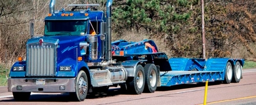 Removable Gooseneck (RGN) Trailer Trucking Service | Cowtown Express