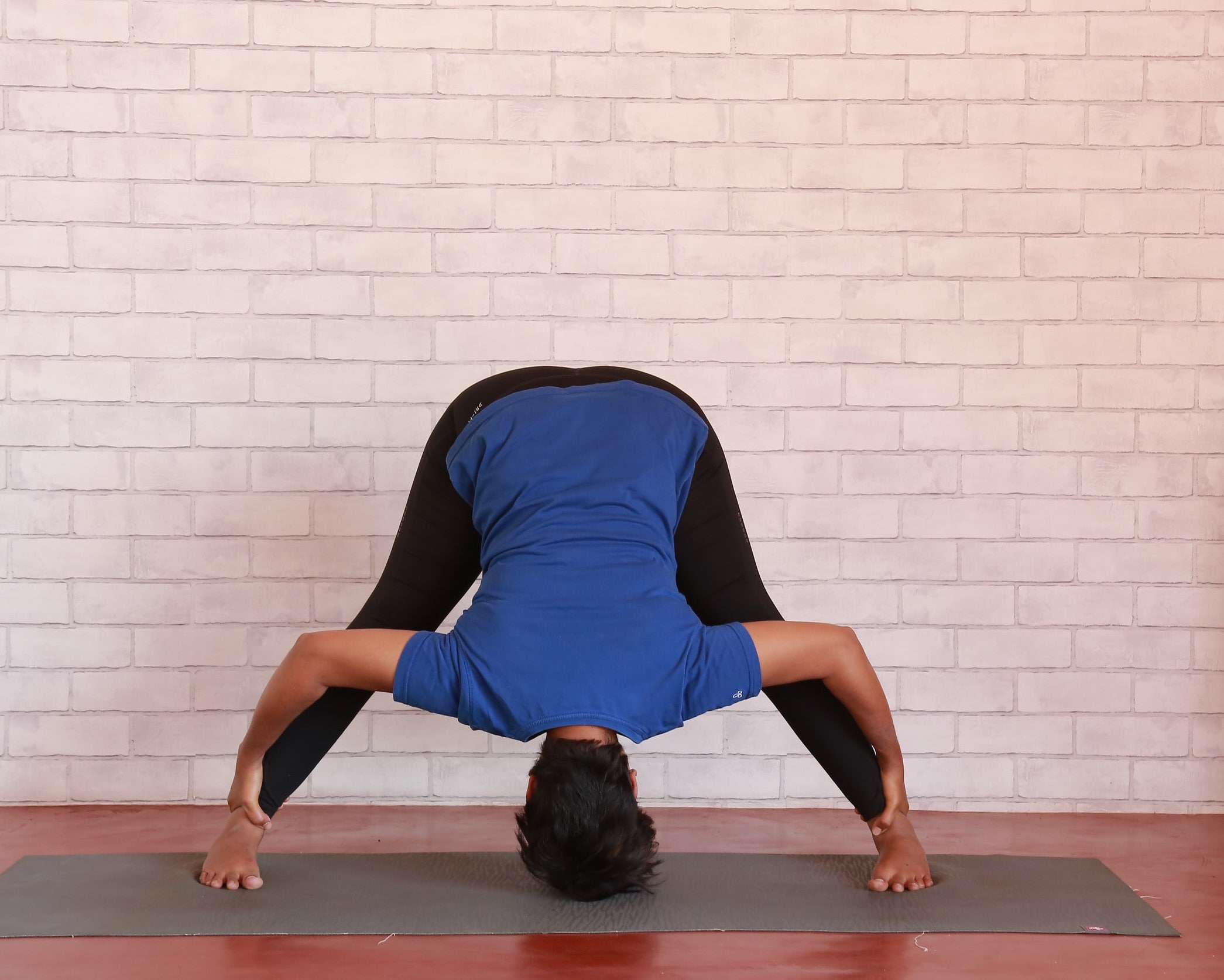 Standing Forward Fold Yoga Asana