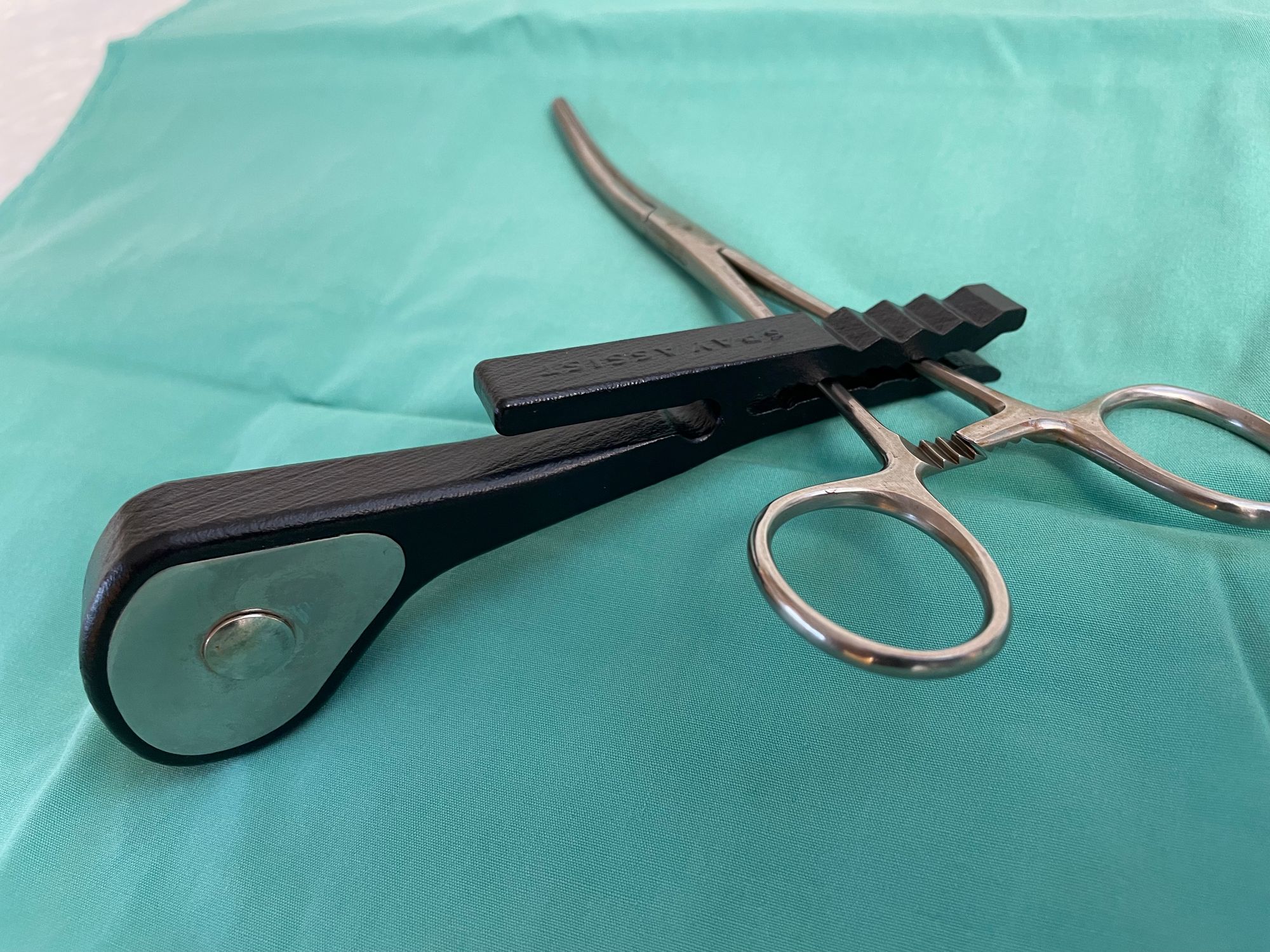 SpayAssist - Weighted Surgical Clamp for Veterinarians.