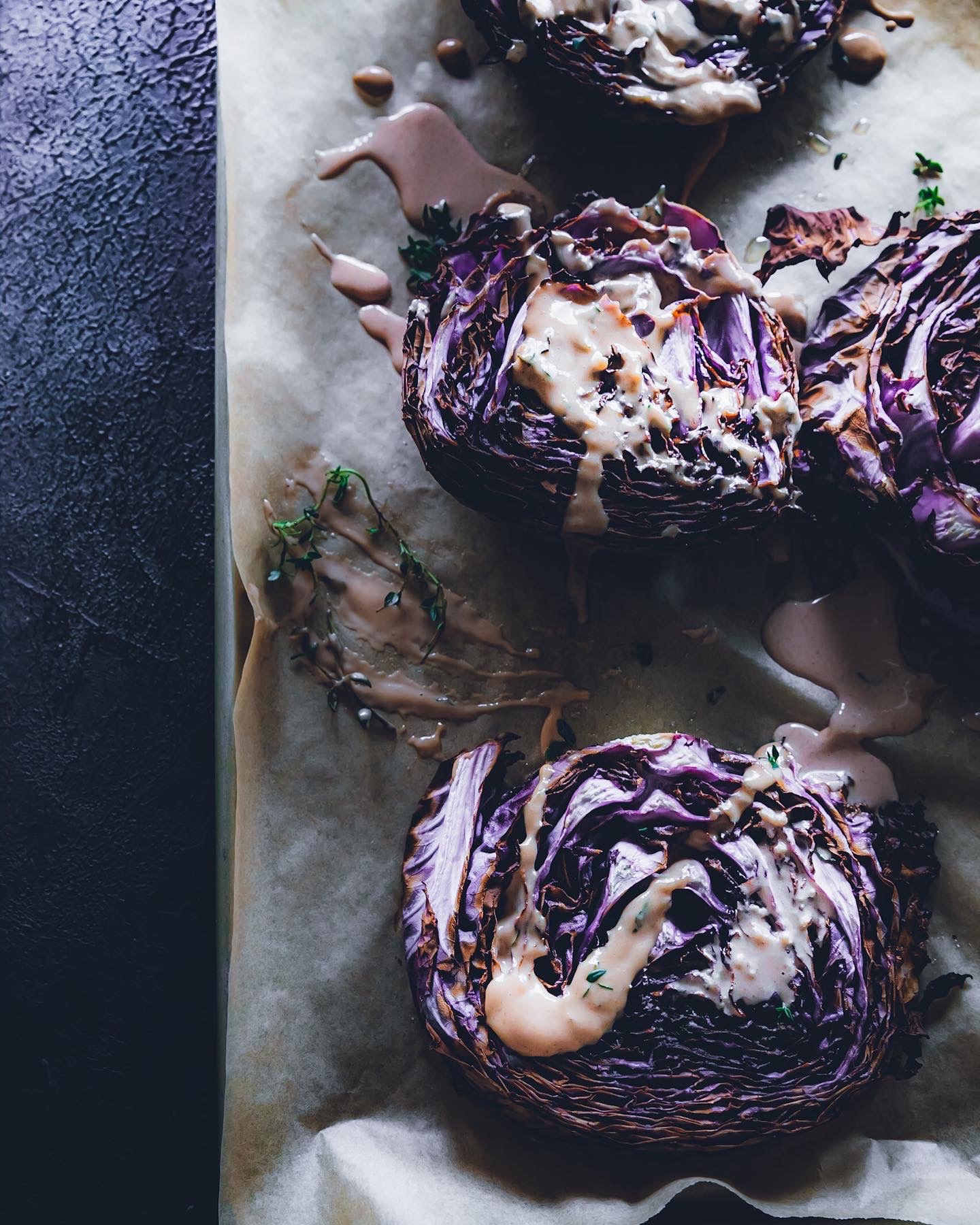 Roasted Purple Cabbage with Sriracha-Thyme Tahini Sauce