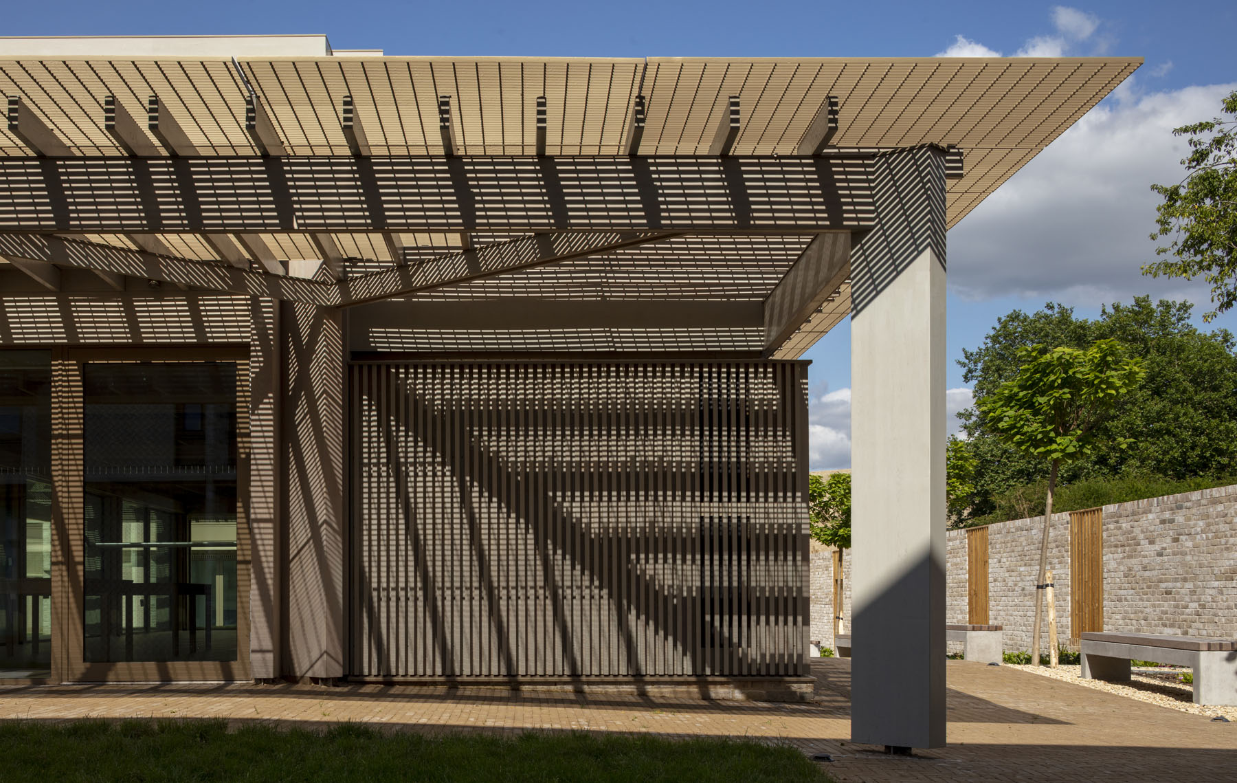 Xylotek - stacked chestnut beams Sport Pavilion - Balliol College Oxford