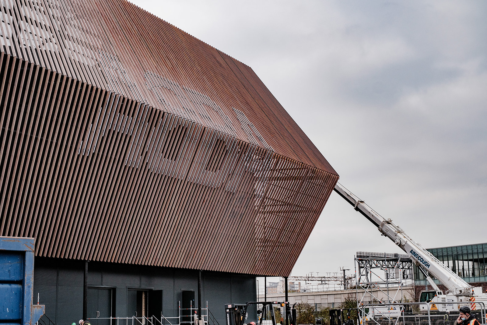 Xylotek - 7000m2 larch screen Exterior Rainscreen - ABBA Arena