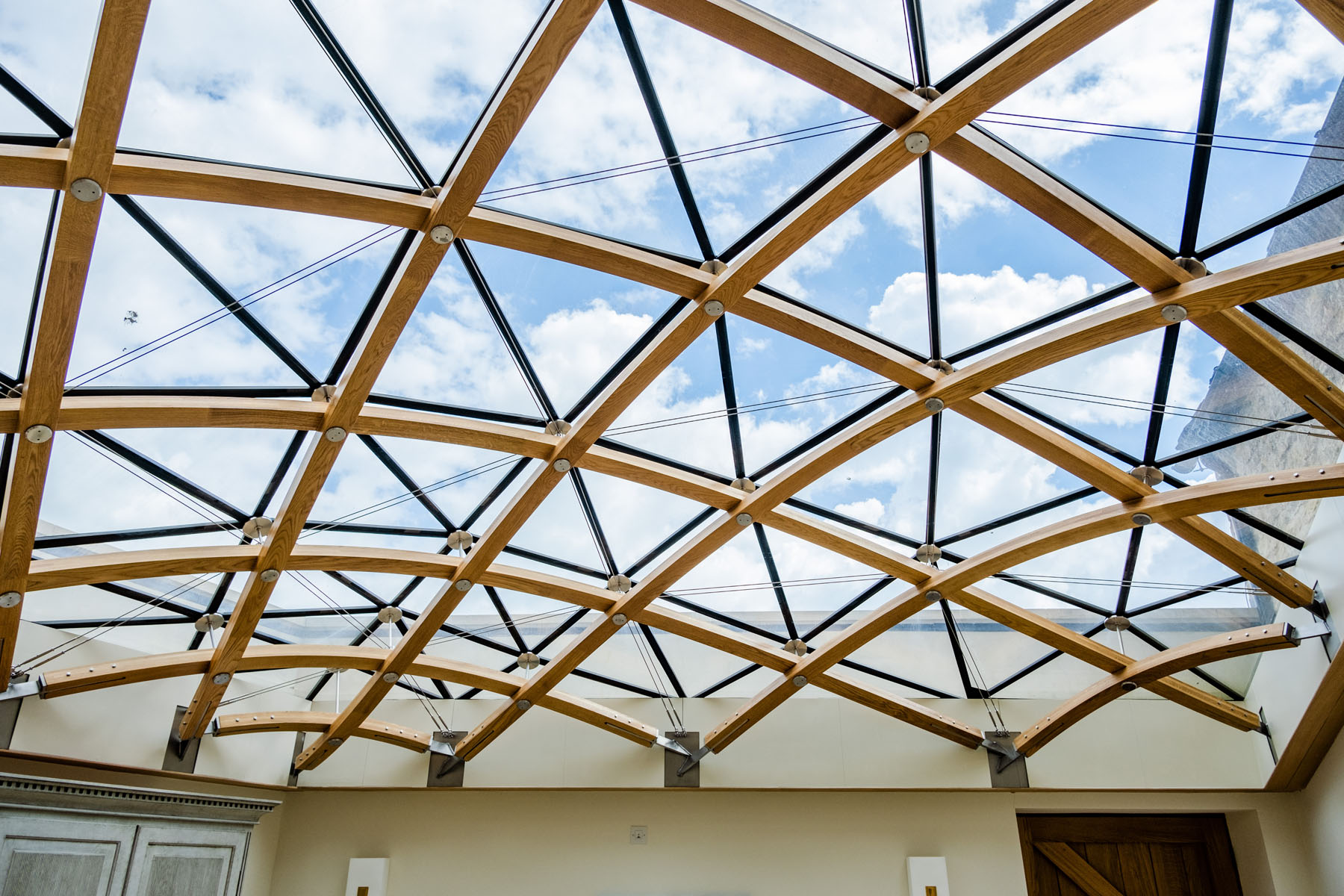 Xylotek - Glazed glue-laminated oak gridshell Sherborne Gridshell