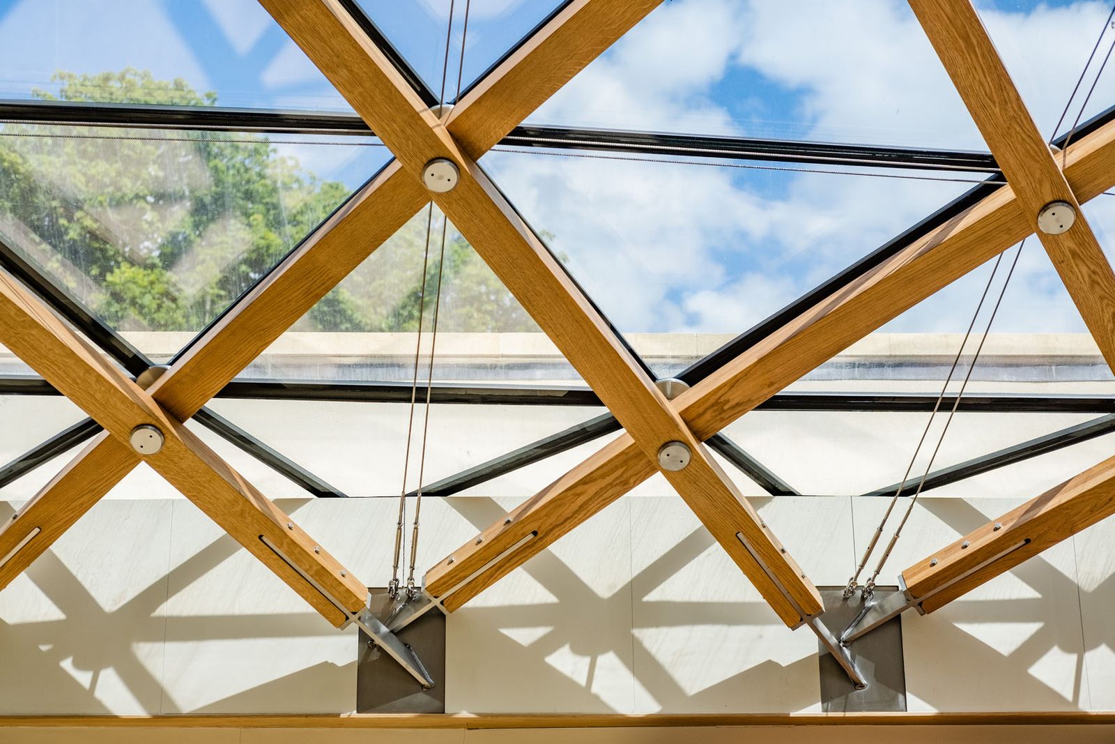 Xylotek - Glazed glue-laminated oak gridshell Gridshell - Sherborne