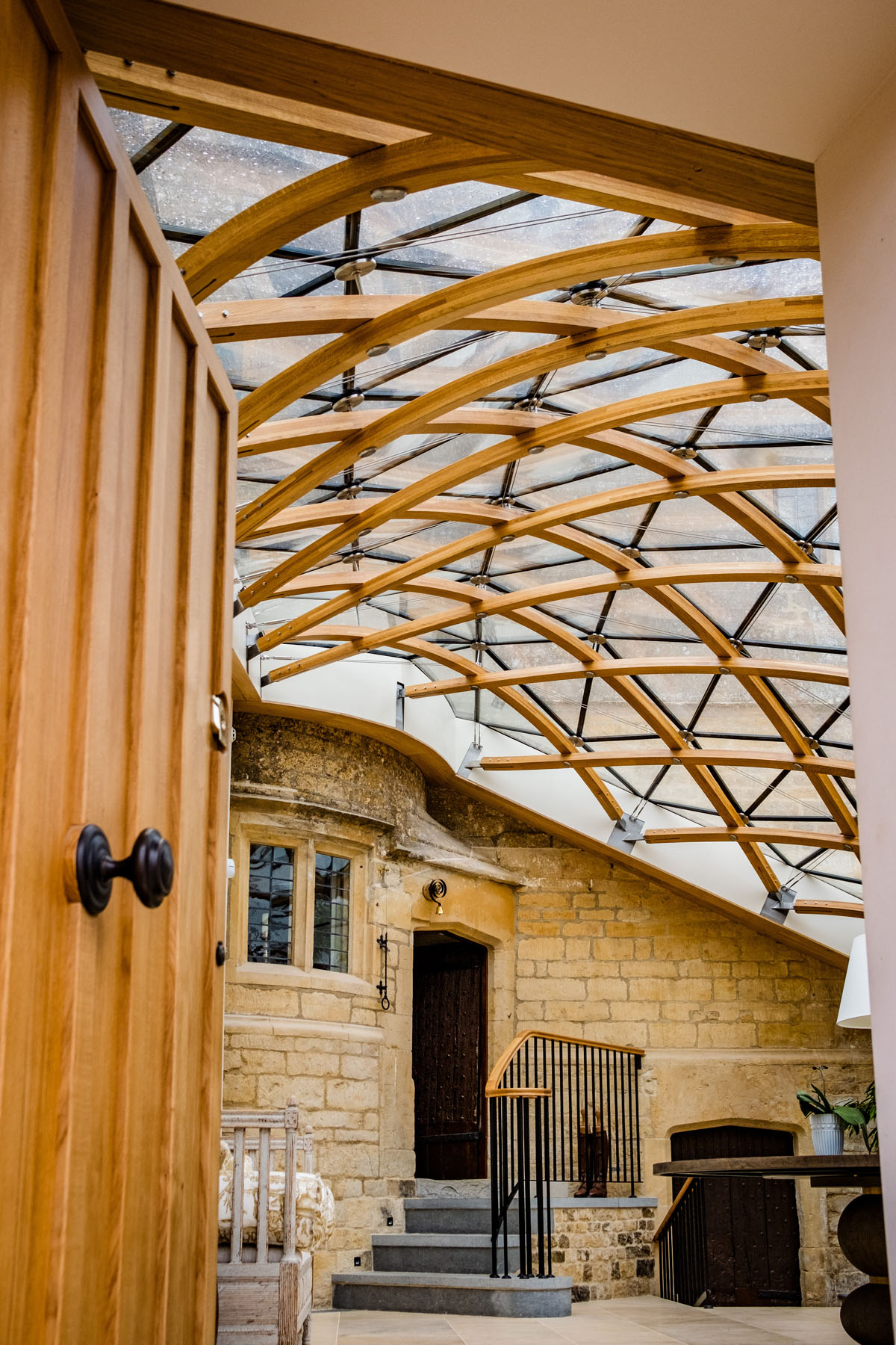 Xylotek - Glazed glue-laminated oak gridshell Gridshell - Sherborne