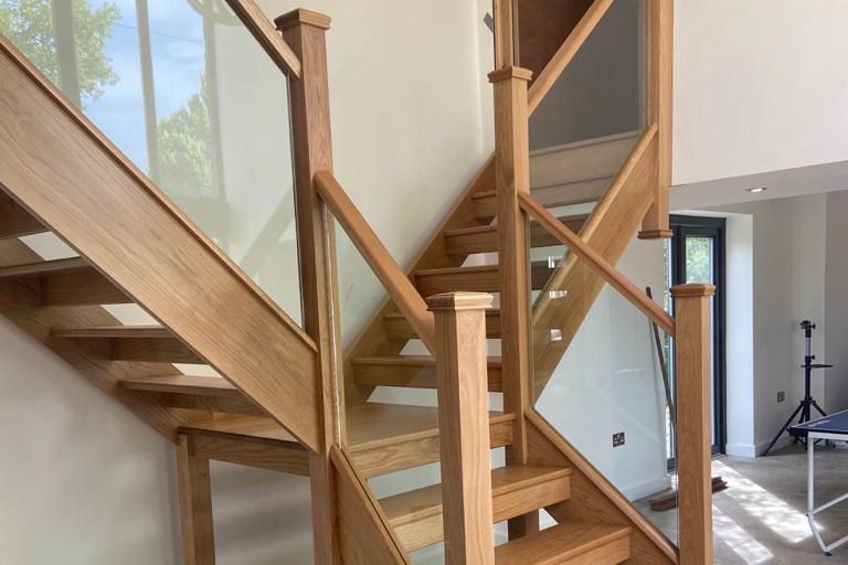 Bifurcated and Splayed Solid Oak Open Riser Staircase With Seamless ...