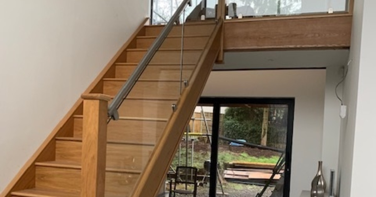 Solid Oak Staircase Installation Featuring Stainless Steel and Glass ...