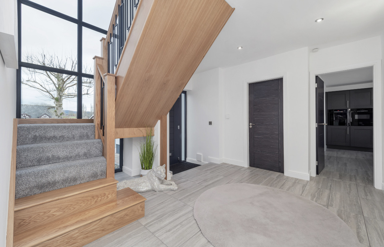 Solid Oak Staircase Installation Featuring Black Iron Box Spindles ...