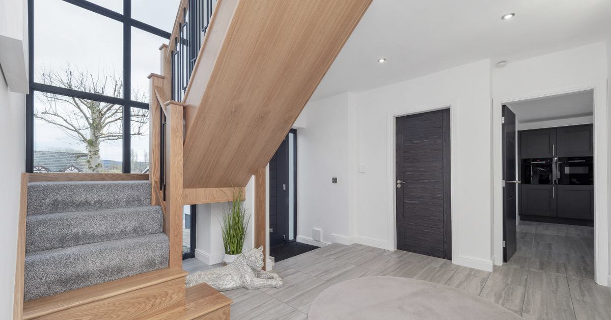 Solid Oak Staircase Installation Featuring Black Iron Box Spindles ...