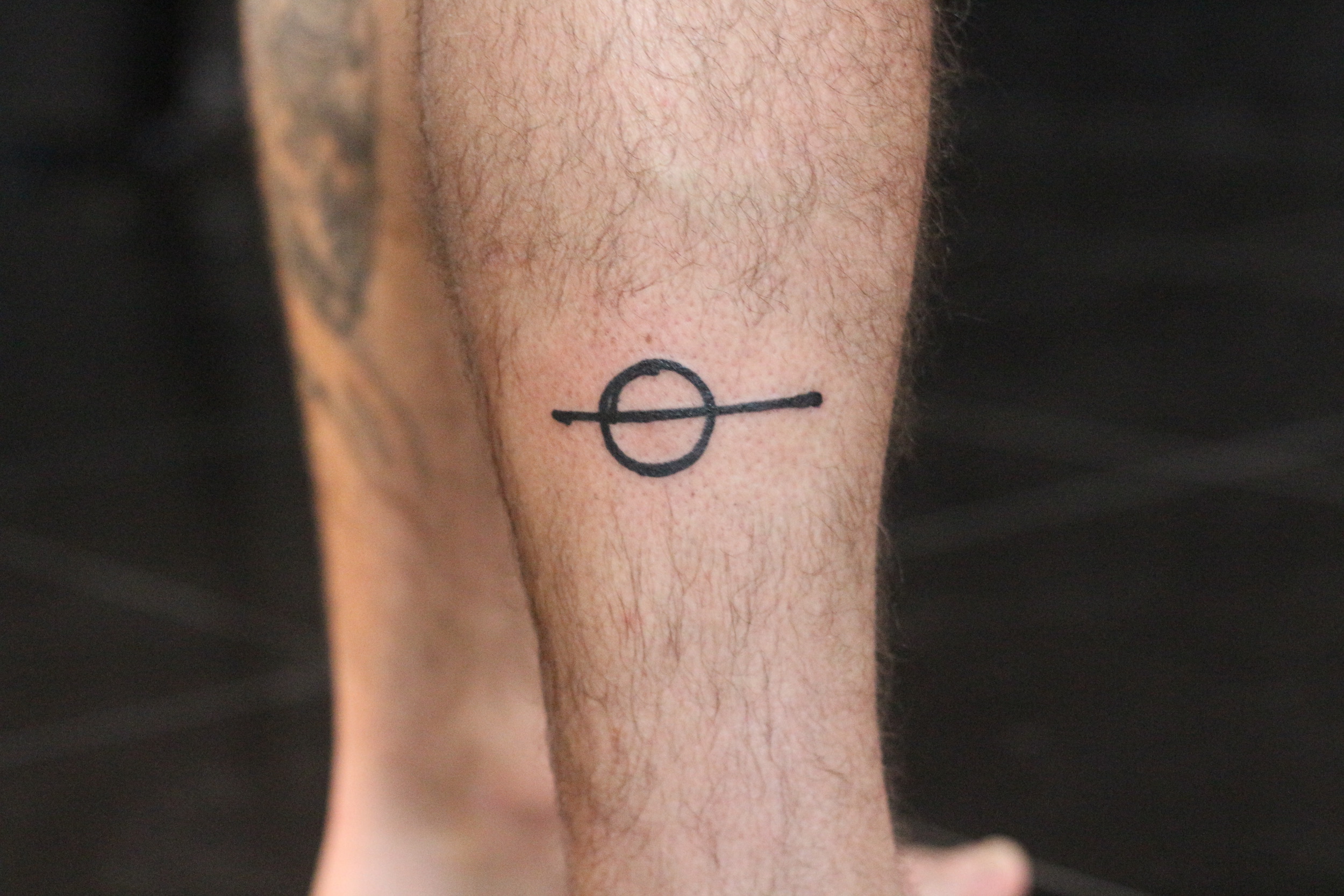 Theta Symbol Tattoo