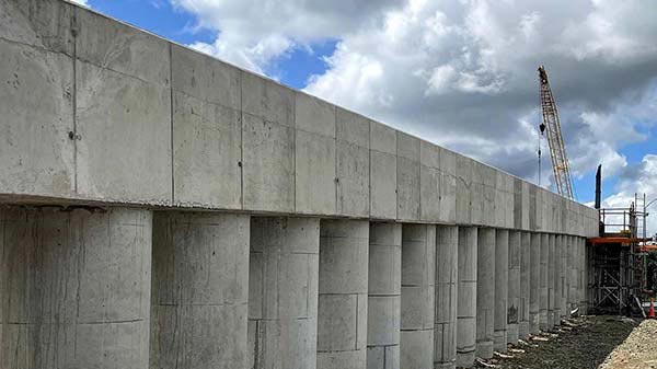 Overbridge Retaining Walls Using Geotub Reusable Formwork