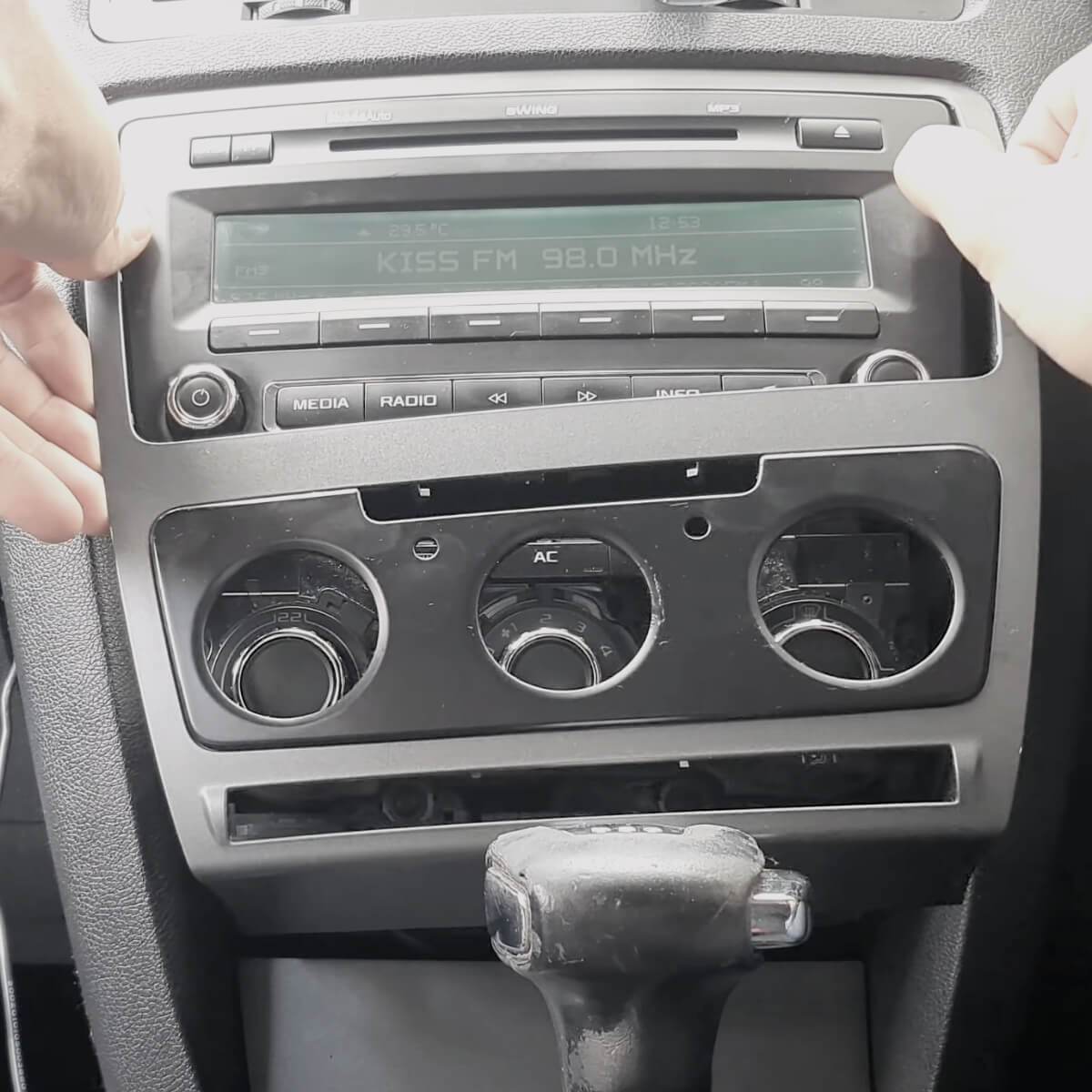 2. Remove the plastic trim around the unit.